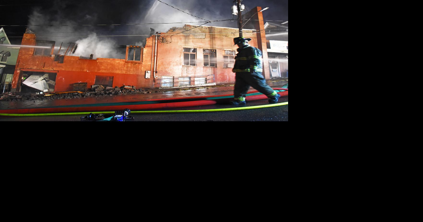 Firefighters combat multi-alarm fire at former Columbia Building Supply ...