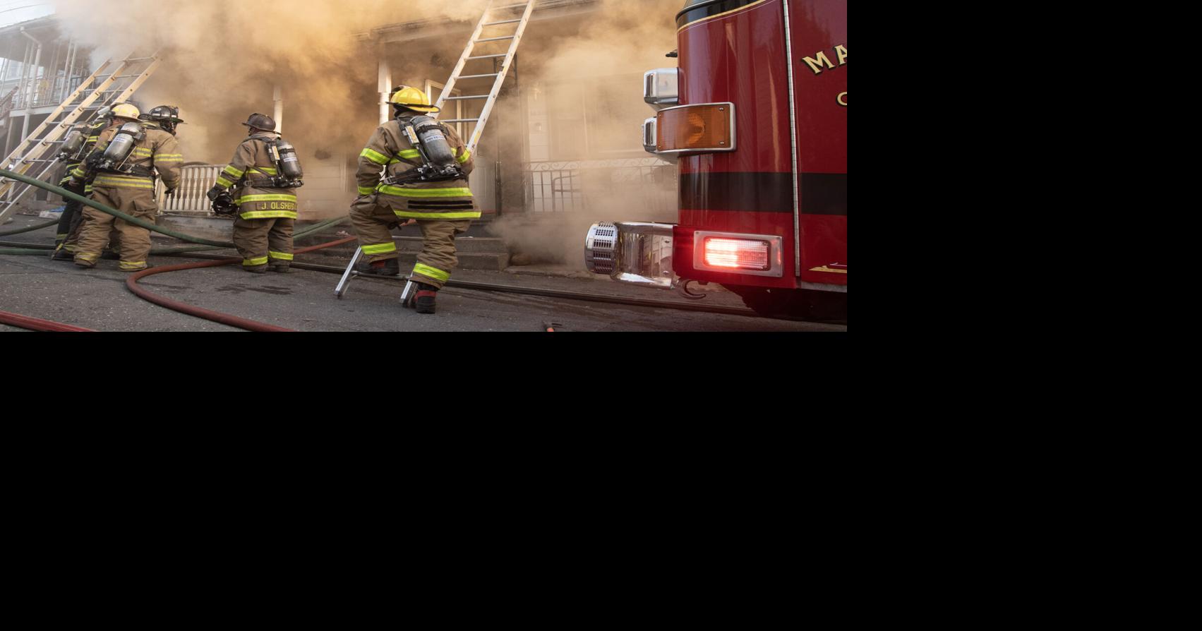 Firefighter rescued from ridge of roof during Springfield house fire ...