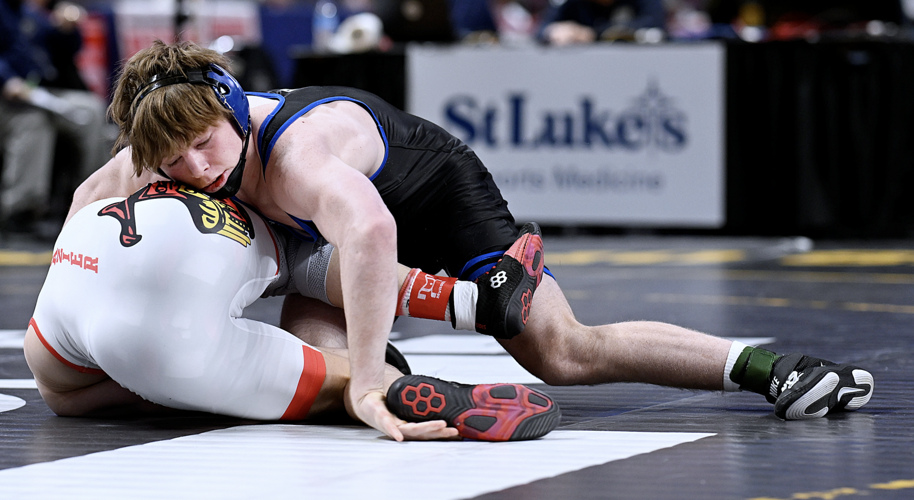 H.S. Wrestling: Defending champ Reagan Milheim clinches spot in third ...