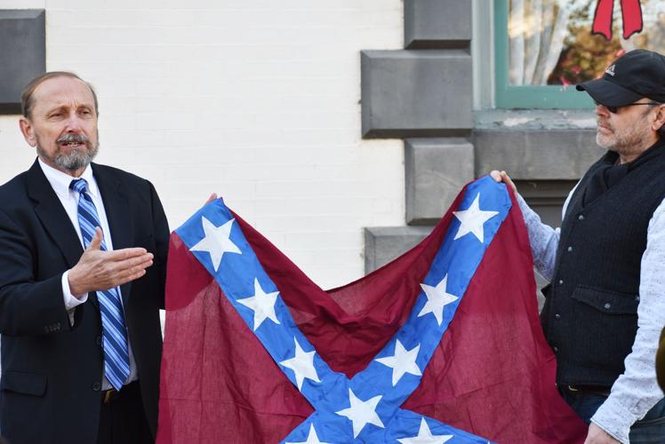 Activist burns Nazi/Confederate flag | Local | newsitem.com