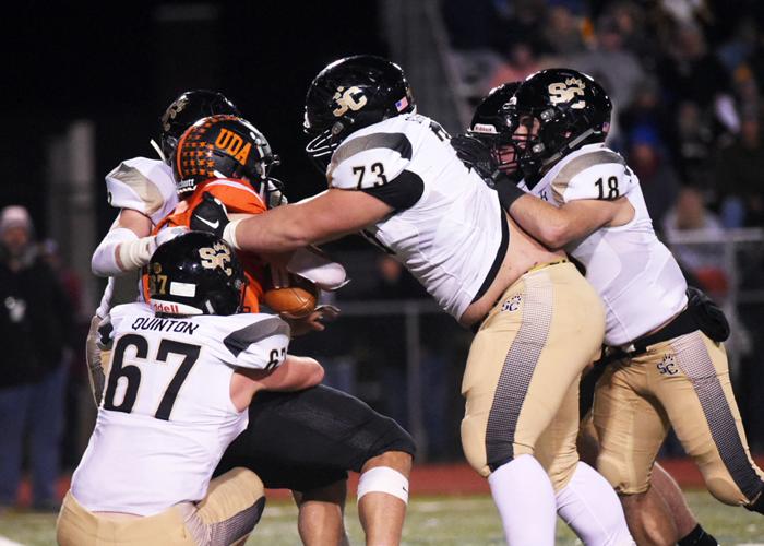 H.S. Football: Tigers topple Trojans 63-22, advance to state semifinal ...