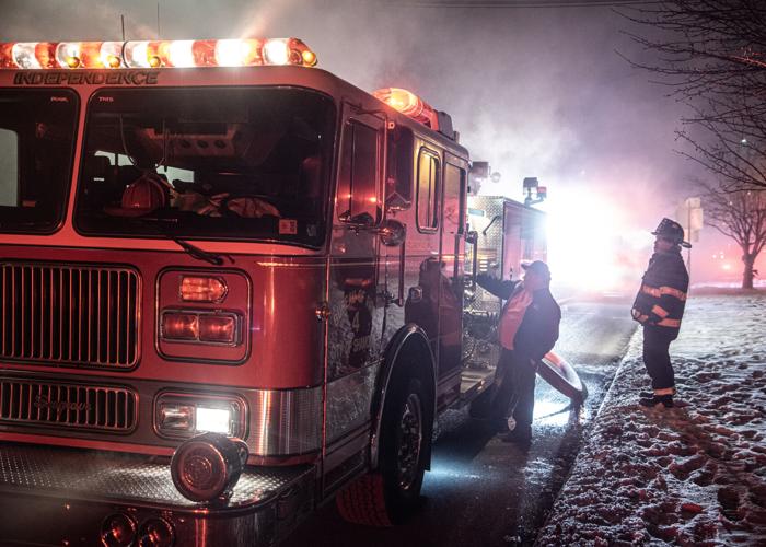 Firefighters contend with smoke, ice and hoarding conditions during ...