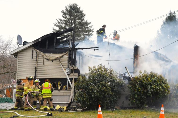 Homeowner taken into custody at scene of fire; police questioning him ...