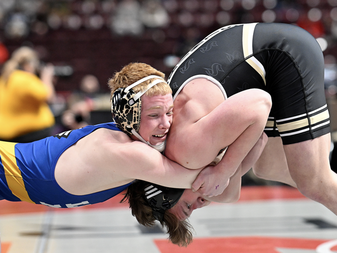 H.S. Wrestling: Defending champ Reagan Milheim clinches spot in third ...