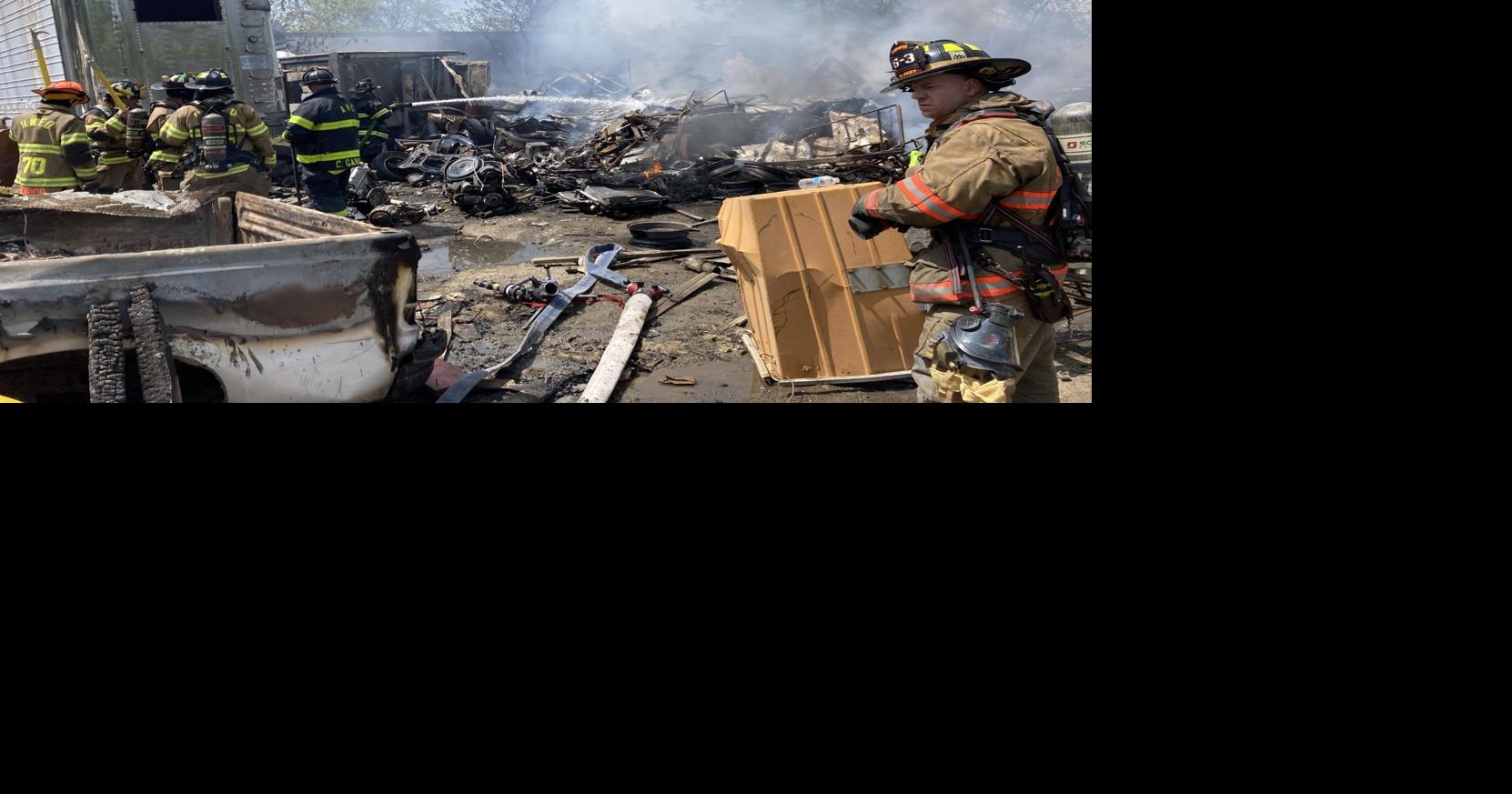 Salvage materials catch fire along Route 61; firefighters pressed into ...
