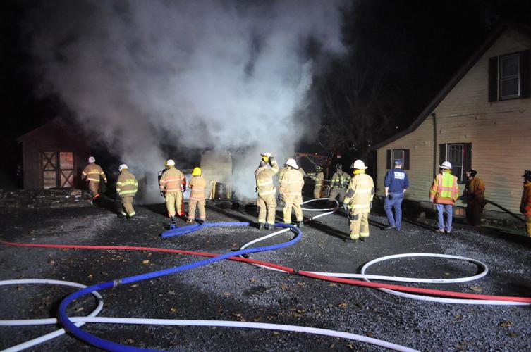 Fire destroys garage as heat from wood burner ignites paint thinner ...