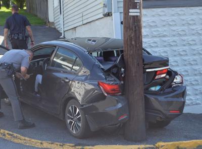 Car rolls backward down hill into telephone pole | | newsitem.com