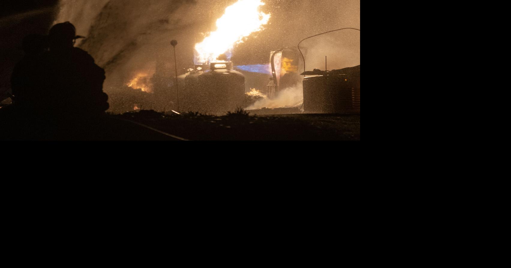 Firefighters contend with venting propane tanks in three-bay garage ...