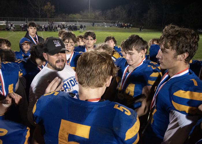 H.S. Football: Eagles prevail in rain to earn first district ...