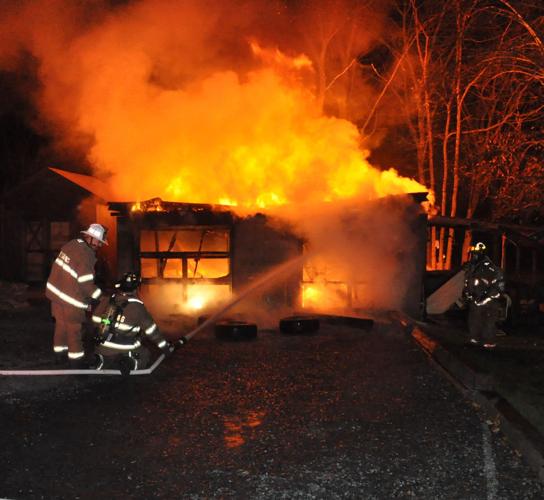 Fire destroys garage as heat from wood burner ignites paint thinner ...