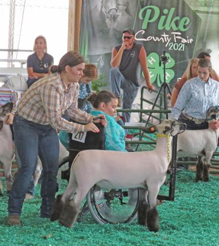 Overcoming lifelong challenges, Helton becomes a Grand Champion for the ...