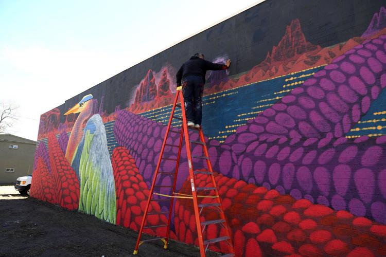 Heraldic herons honor Southwest traditions in 'Monsoon Wisdom' mural ...