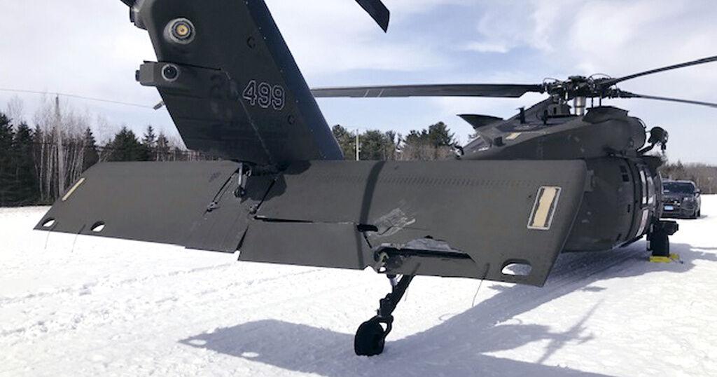 A snowmobiler who crashed into a parked Black Hawk helicopter is ...