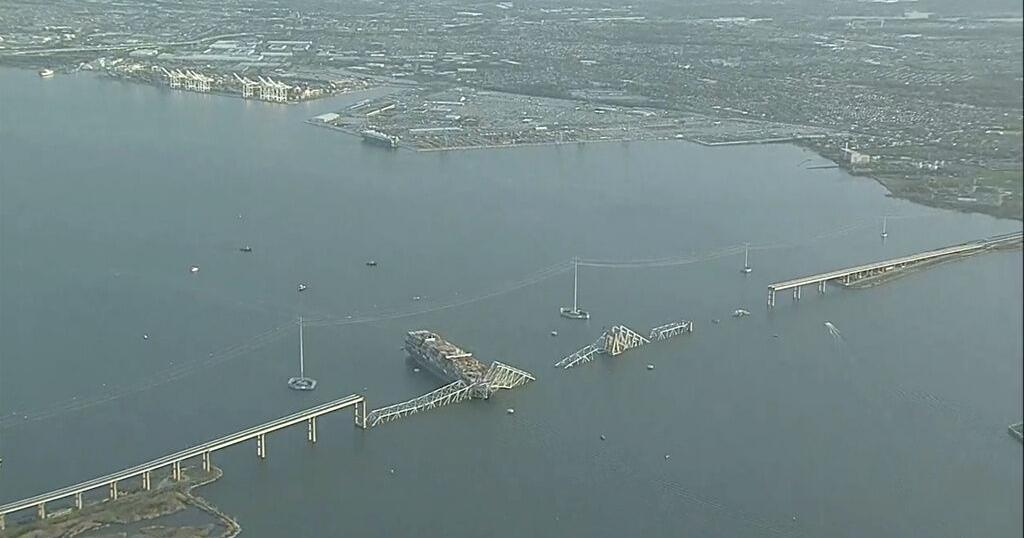 Cargo ship hits Baltimore's Key Bridge, bringing it down. | News ...