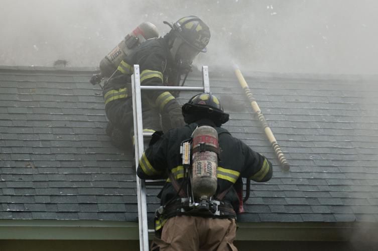 SLIDESHOW: Firefighters battle Lockport house fire | Local News ...
