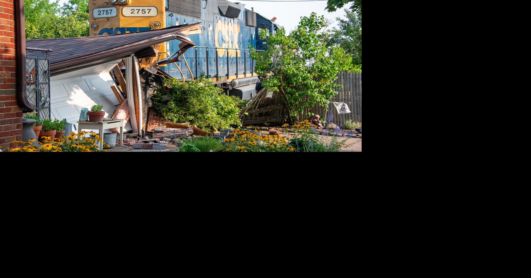 Train crashes into Falls home's garage for a second time | Local News ...