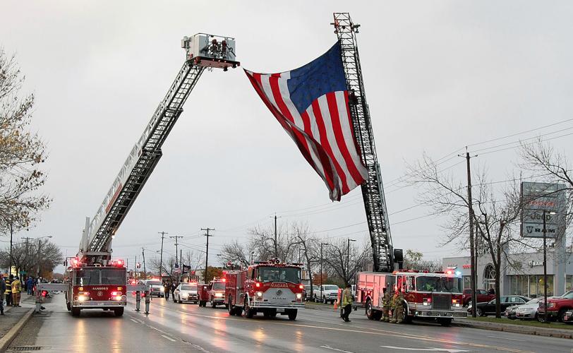 SLIDESHOW: Electric Lights Parade makes its way down Military Road ...