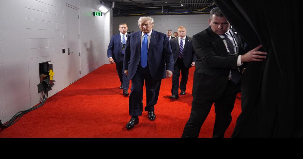 The stepped-up security around Trump is apparent, with agents walling ...