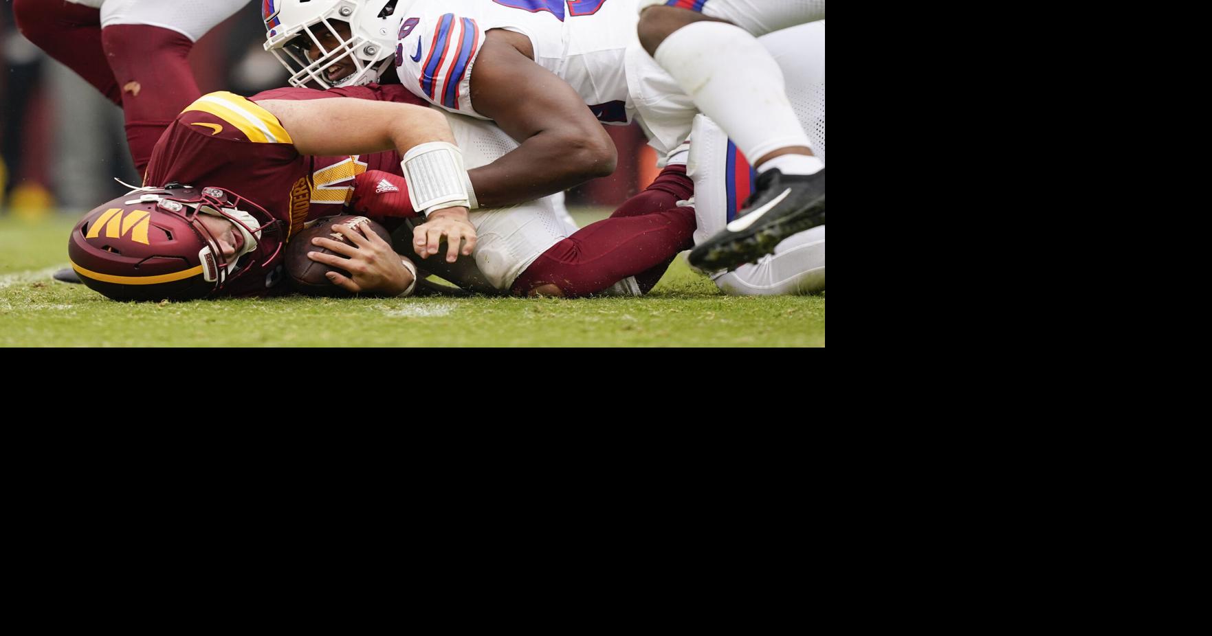 Bills defensive line pummels Commanders quarterback Sam Howell with 9 ...
