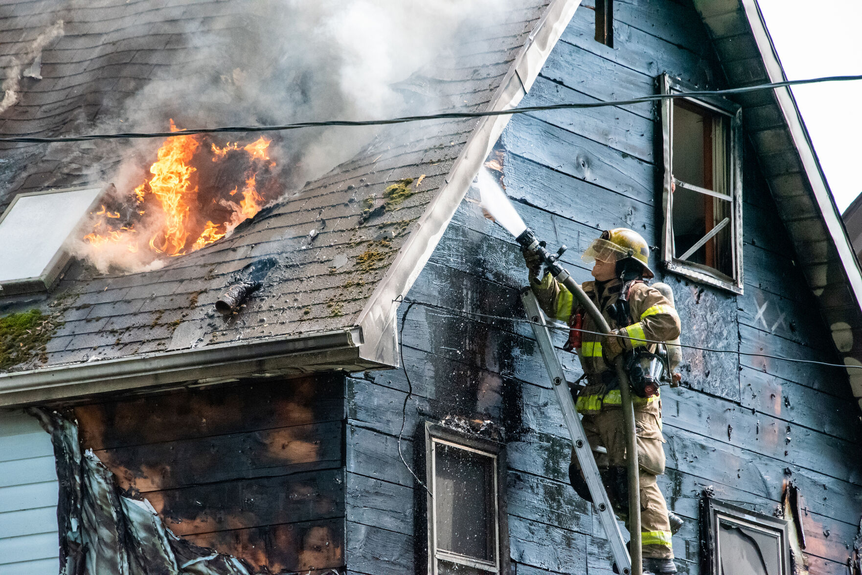 Firefighters battle 57th Street house fire Monday afternoon | Local ...