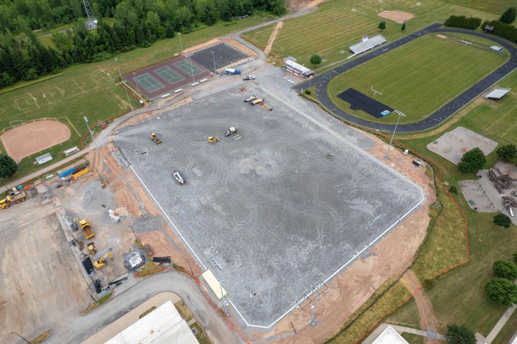 Barker puts final touches on multi-purpose turf field ahead of new ...
