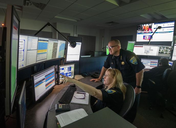 Dedicated team mans the phones at the Niagara County Dispatch Center ...