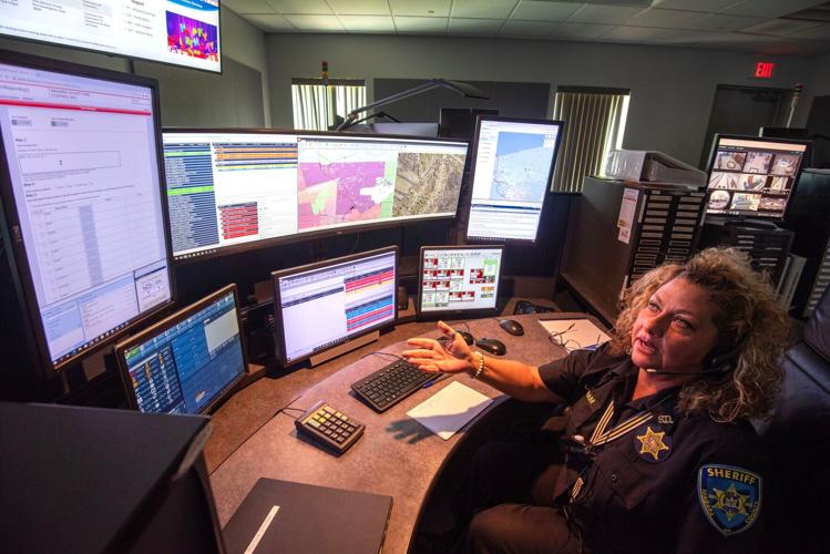 Dedicated team mans the phones at the Niagara County Dispatch Center ...