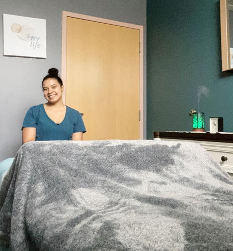 Massage therapy business born from one sister helping another | Local ...