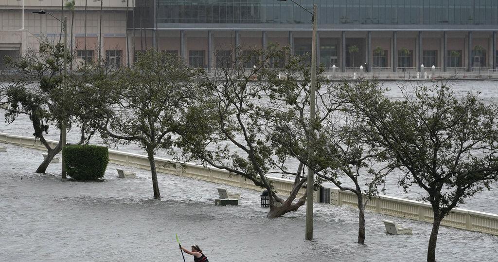 Hurricane Idalia hits Florida with 125 mph winds, flooding streets, snapping trees and cutting ...