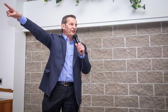 Mark Hebscher shares anecdotes during Wild Game Dinner