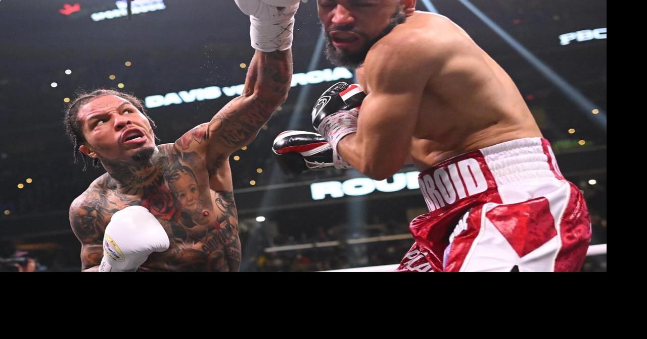 Davis beats Garcia by TKO, retains WBA lightweight title