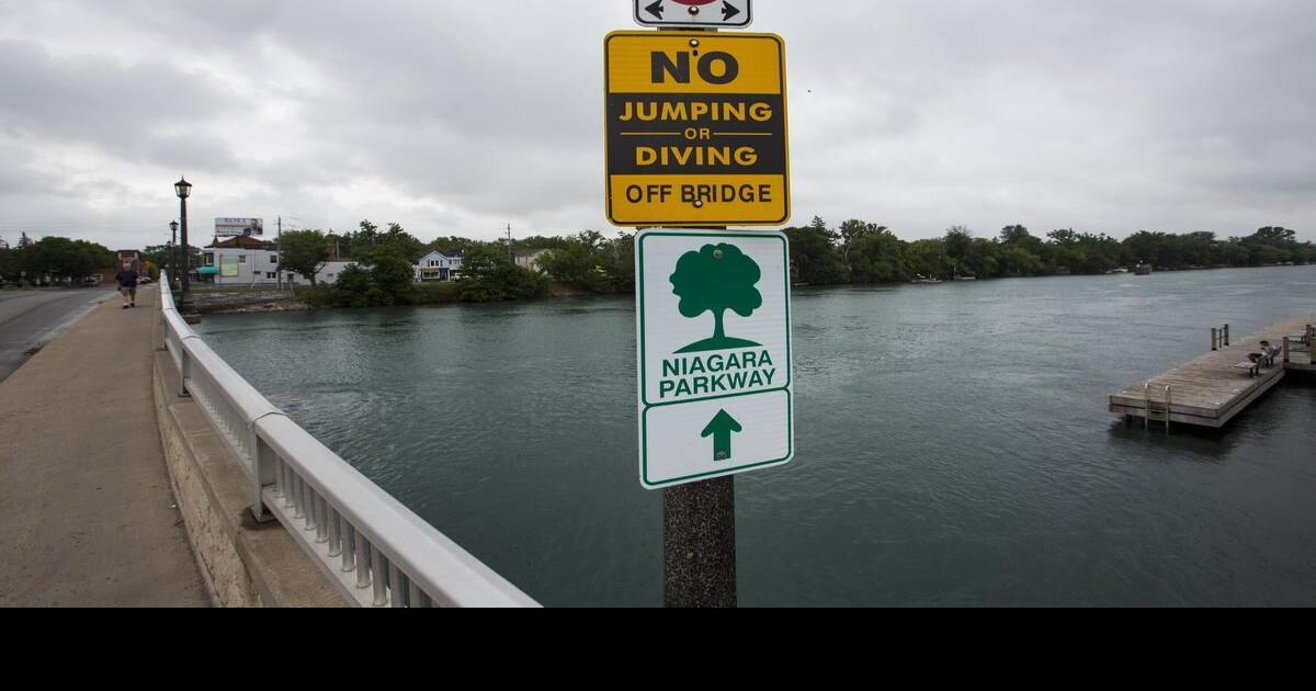 Despite enforcement and signs, jumping and diving off bridge in ...