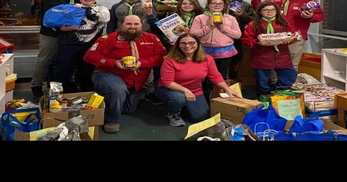 10th Welland Scouts pound the pavement to help neighbours