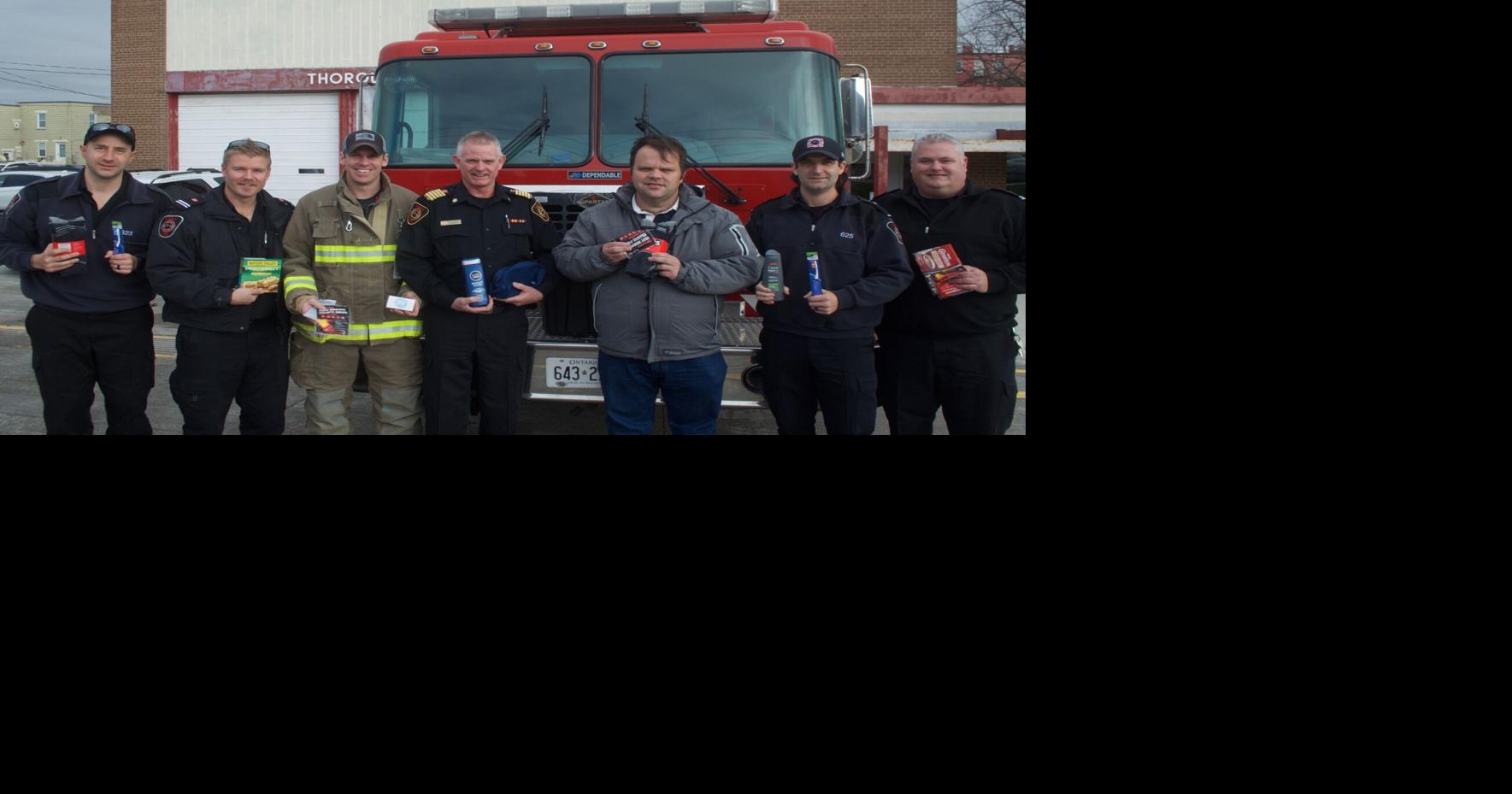 Thorold Firefighters stand with Toolbox Project