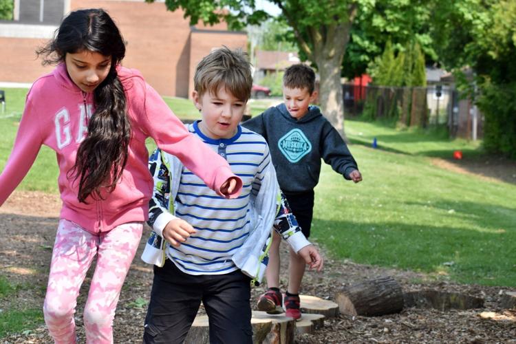 Students get back to nature with naturalized playground