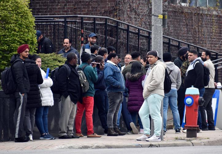 ‘I am here to work’: Asylum seekers pour into job fair