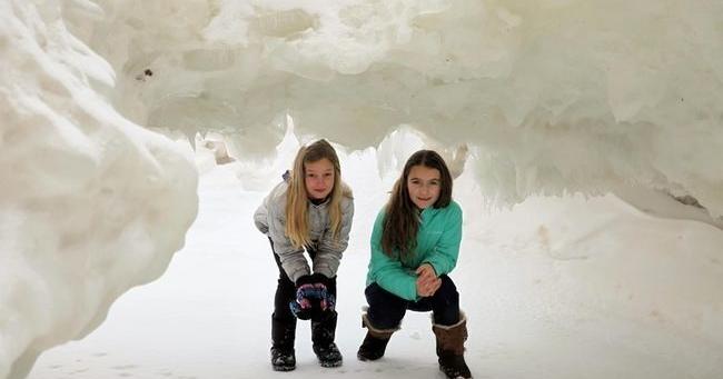 Residents explore Crystal Beach ice caves