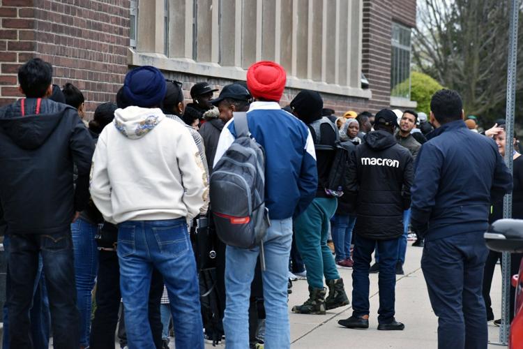 ‘I am here to work’: Asylum seekers pour into job fair