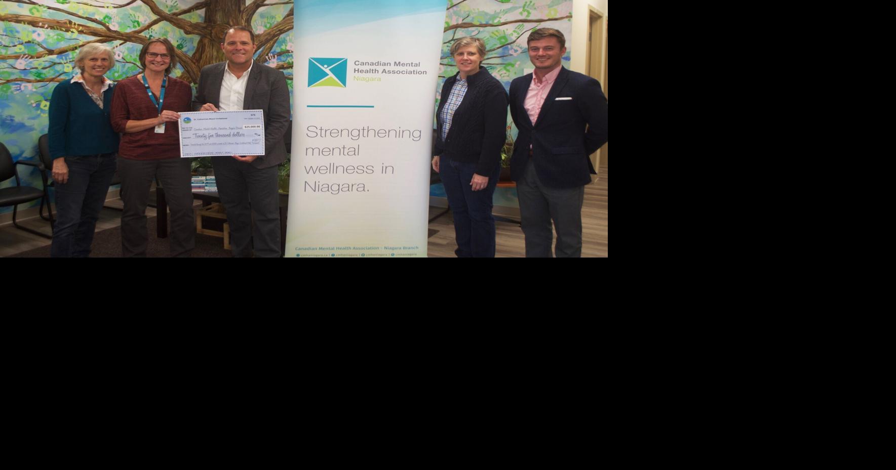 CMHA Niagara presented cheque from St. Catharines Mayor Golf Tournament