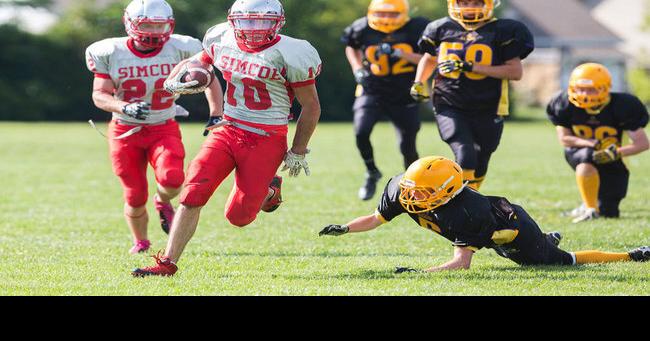 Redcoats dump Bears in football opener.