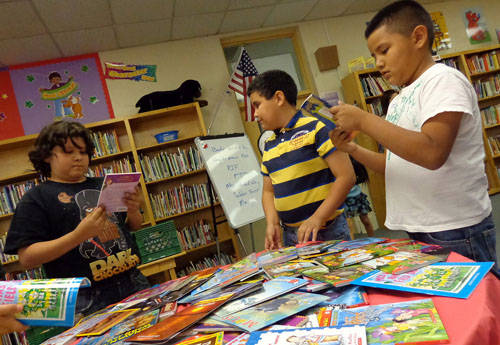 Book distribution effort encourages kids to read | Community ...