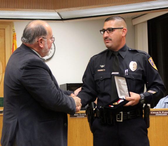 Two NPD officers awarded for life-saving efforts | Local News Stories ...