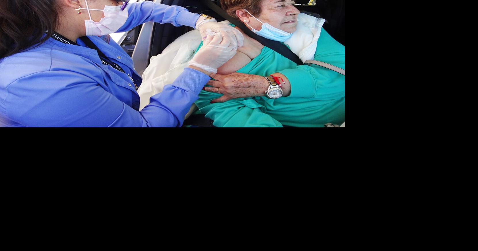 Drive-through vaccination is put to the test | Coronavirus ...