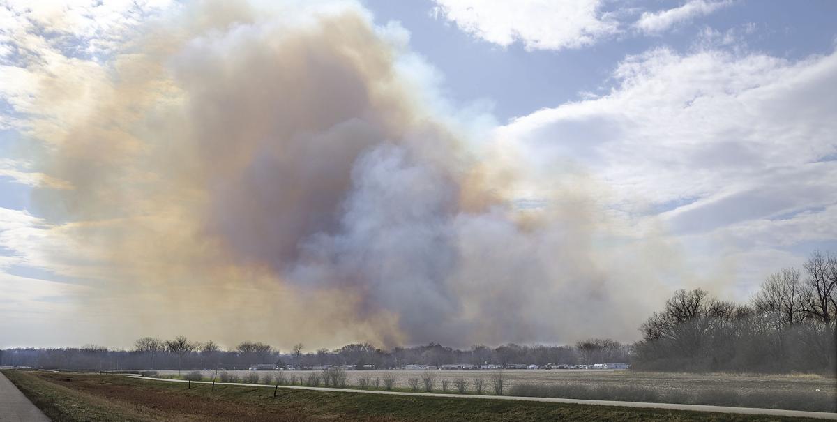 Watch as a brush fire sends smoke billowing over metro area Sunday ...