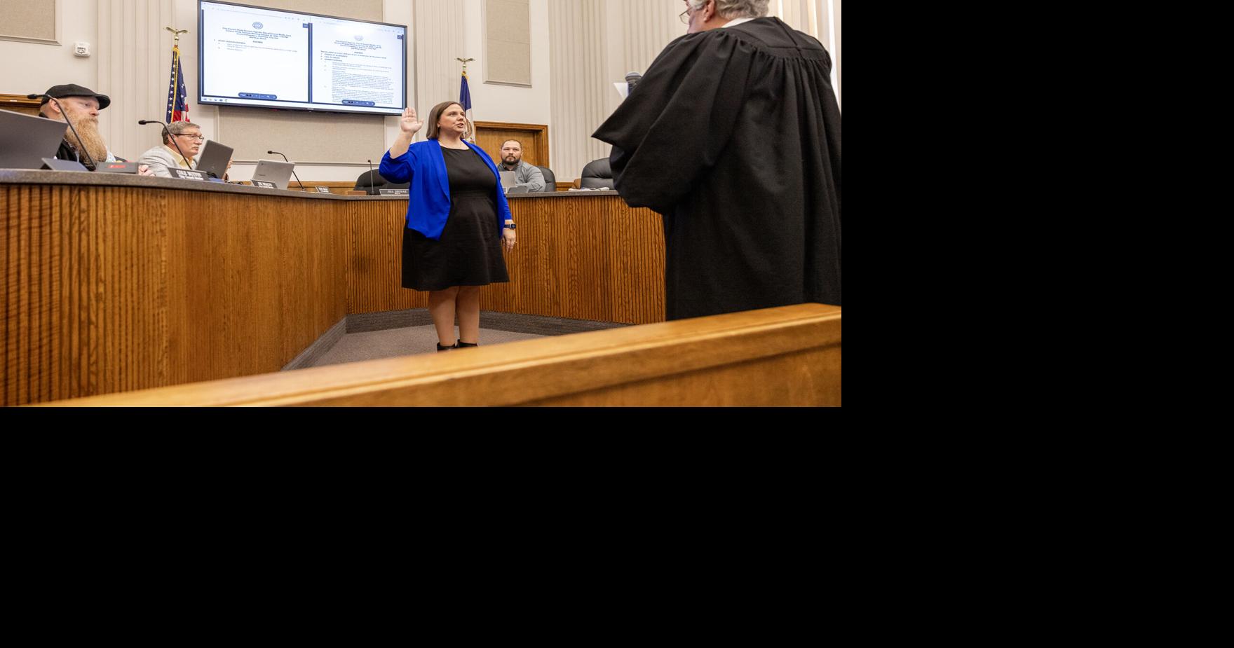 Jill Shudak, Cole Button and Steve Gorman take ceremonial oaths of office