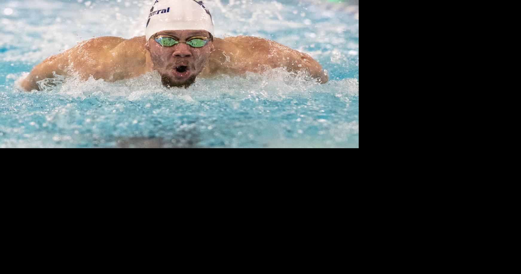 Titans battle in home swim meet