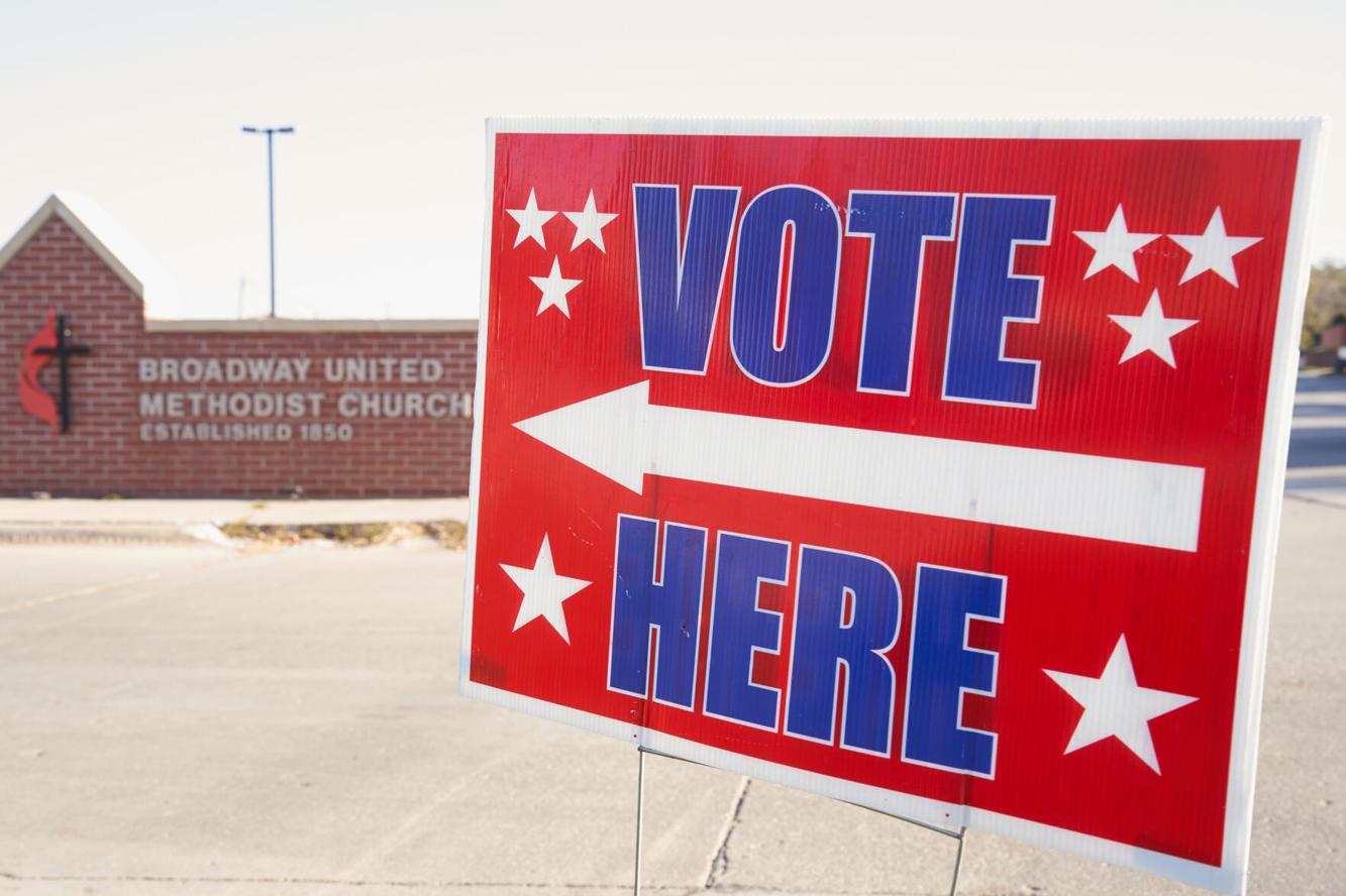 Voter comes straight from work to vote for bond