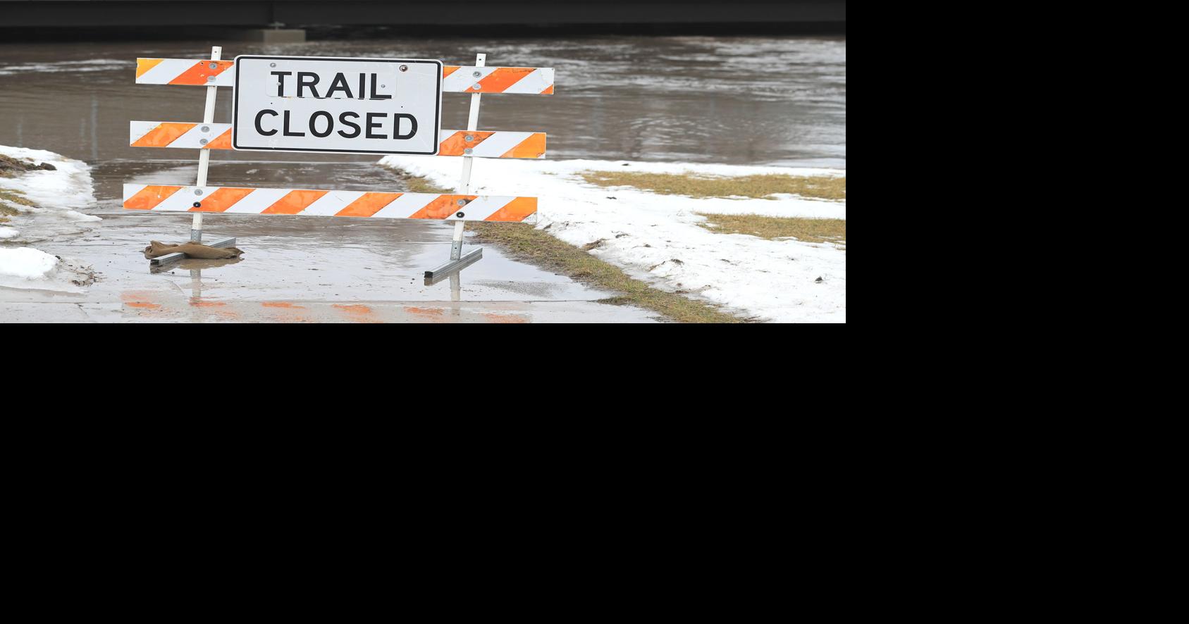 Weather updates: River flood warning issued; water and mud cause road ...