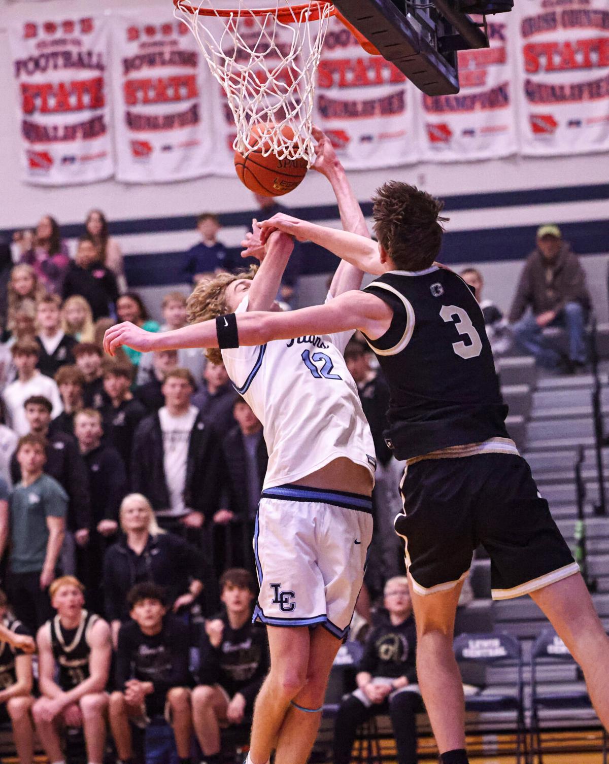 Lewis Central boys basketball pulls away late to defeat Glenwood