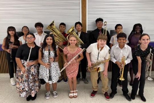 Denison Middle School students play in honor band